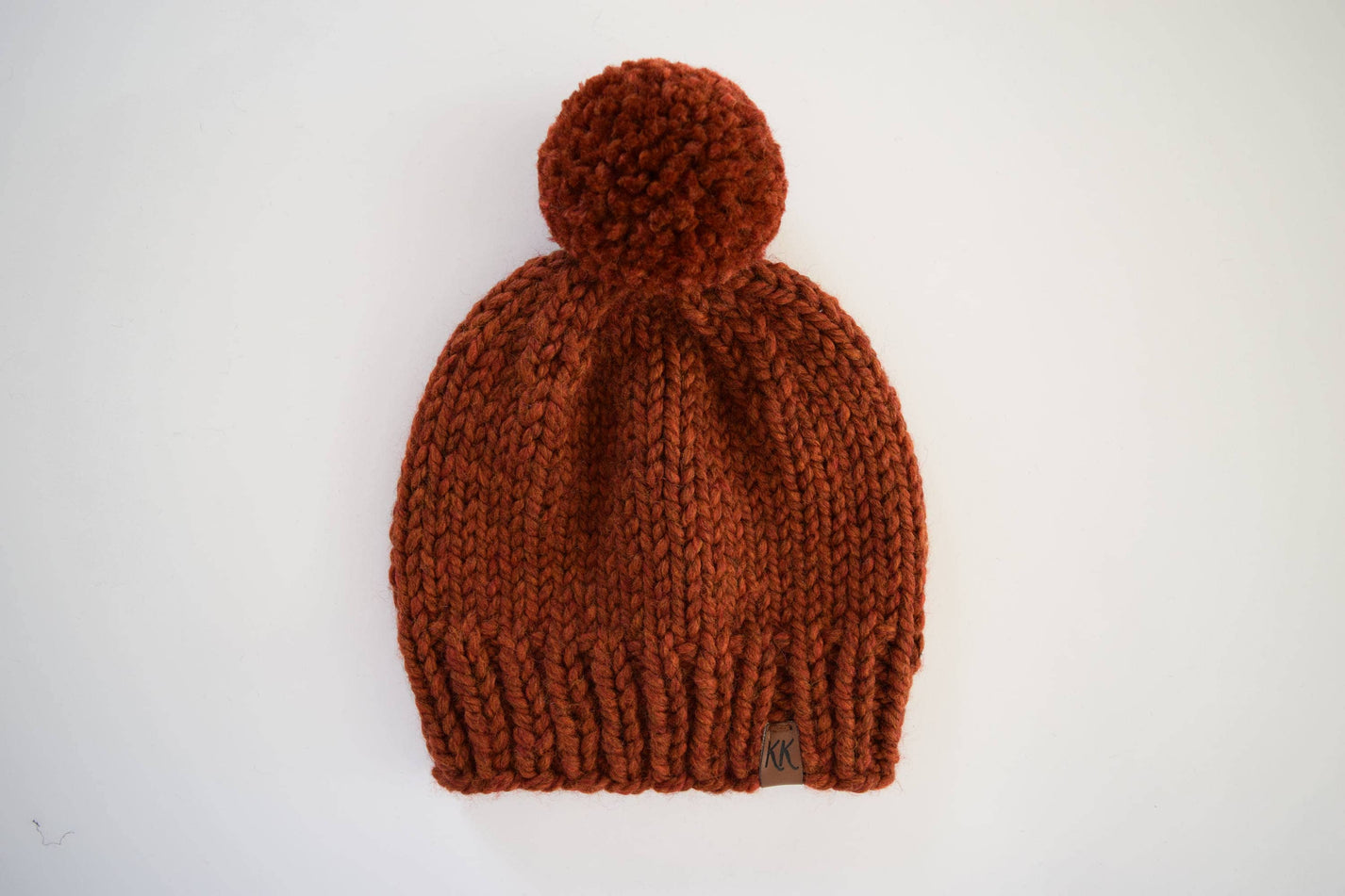 Chunky Knit Pom Pom Beanie - pattern by Knifty Knittings