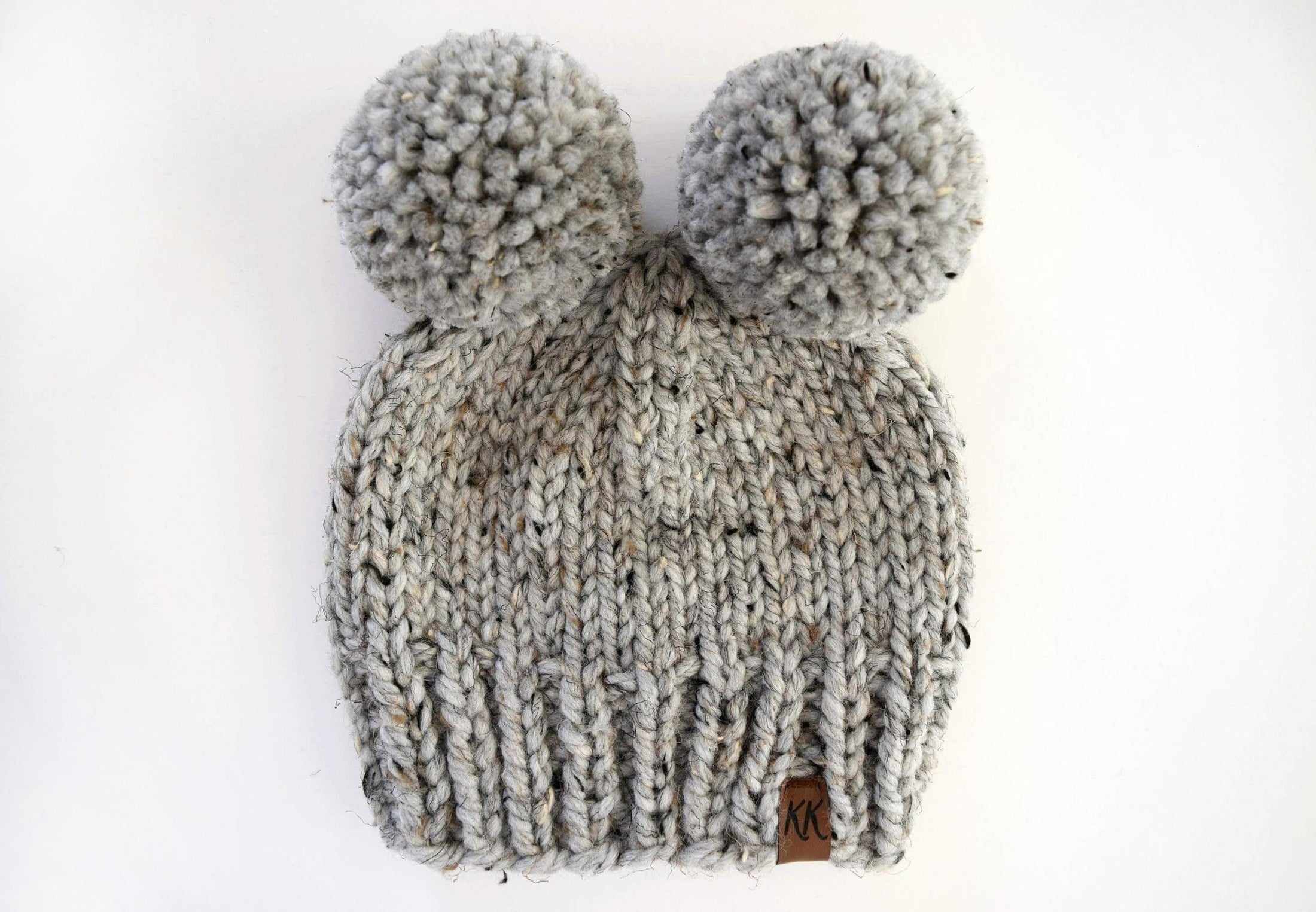 Chunky Knit Pom Pom Beanie - pattern by Knifty Knittings